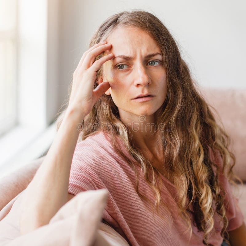 Sad Woman Thinking about Problem, Sitting Alone on Couch Stock Image ...