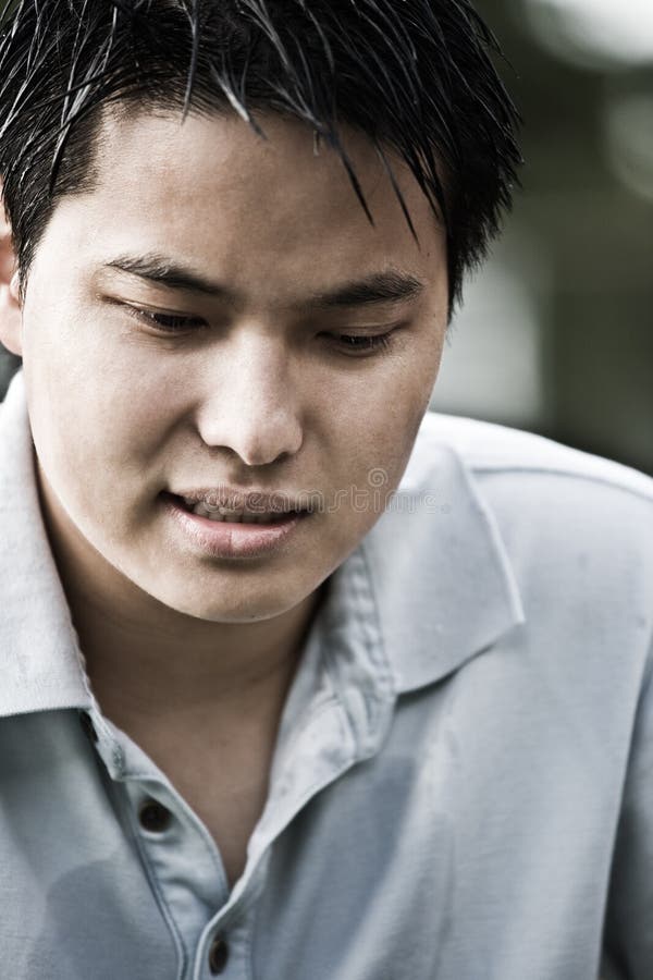 Sad young asian male stock photo. Image of asian, sweat - 7036474