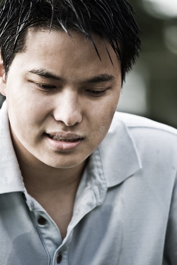 Sad young asian male stock photo. Image of asian, sweat - 7036474