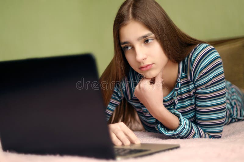 Sad Young Beautiful Girl Using Laptop Computer Doing Her Homework Stock ...
