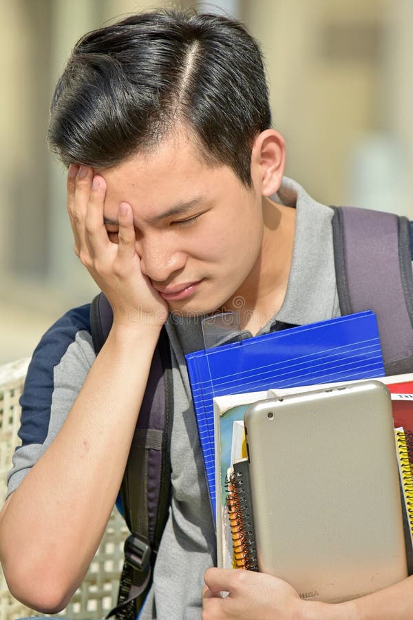 Sad Young Chinese Person stock image. Image of youthful - 135663873