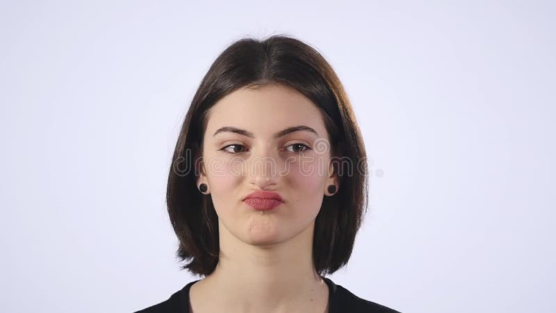 Sad Young Female Sighing with Disappointment Standing on White ...