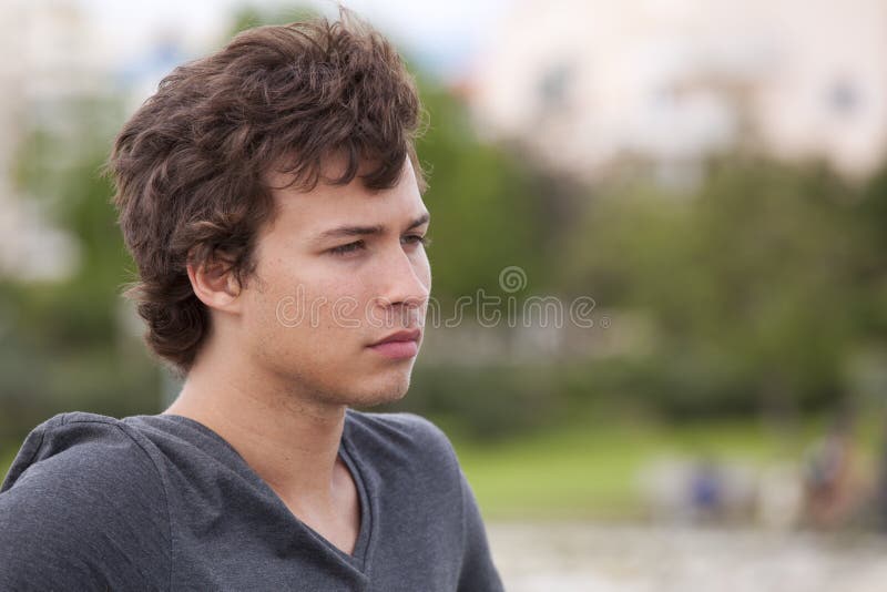 Sad young man stock image. Image of emotion, looking - 26260625