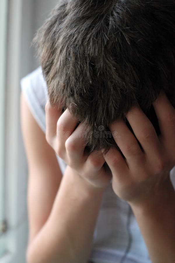 Sad Young Man stock photo. Image of indoor, single, anguish - 28116110