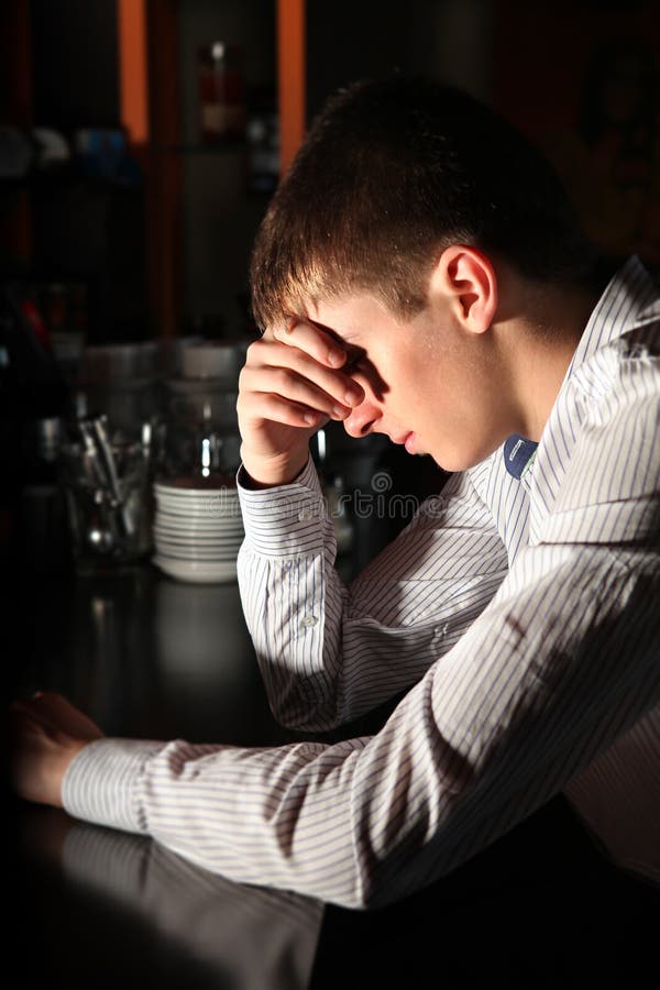 Sad Young Man at the Bar stock image. Image of indoor - 29400757
