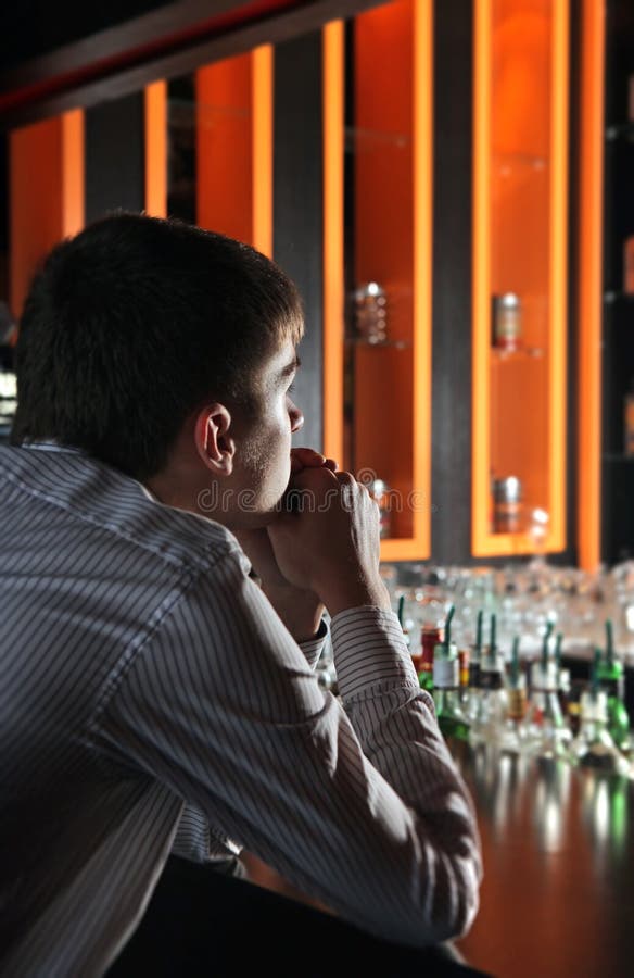 Sad Young Man at the Bar stock photo. Image of restaurant - 29400778
