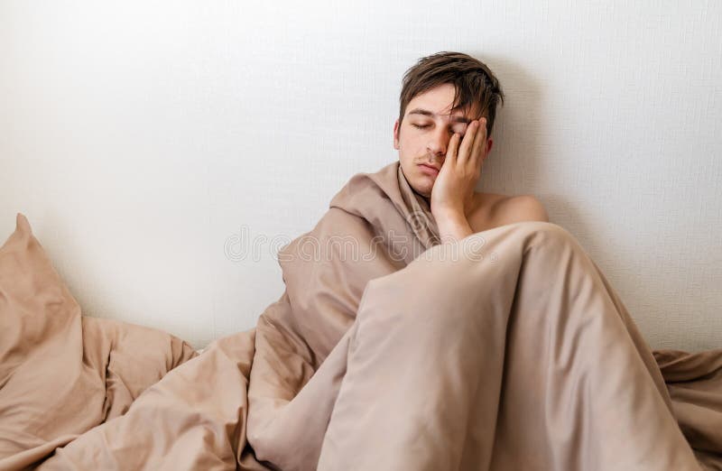 Sad Man in the Bed stock photo. Image of insomnia, distress - 250498084