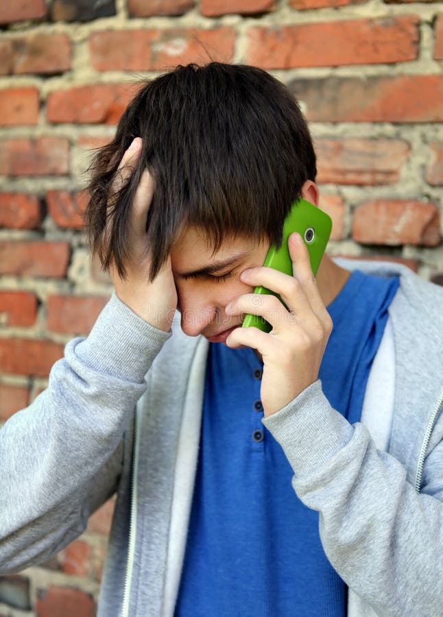 Sad Young Man with Cellphone Stock Image - Image of call, hopeless ...