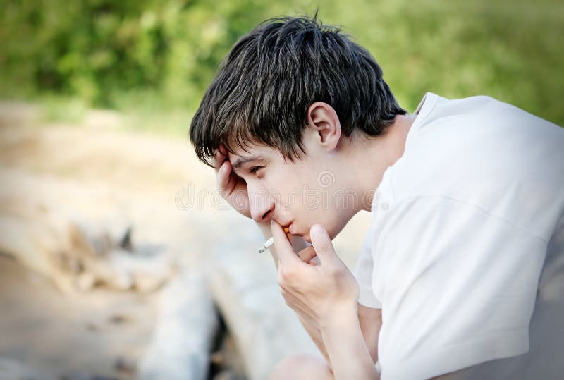 Sad Young Man stock image. Image of sorrowful, smoking - 72142305
