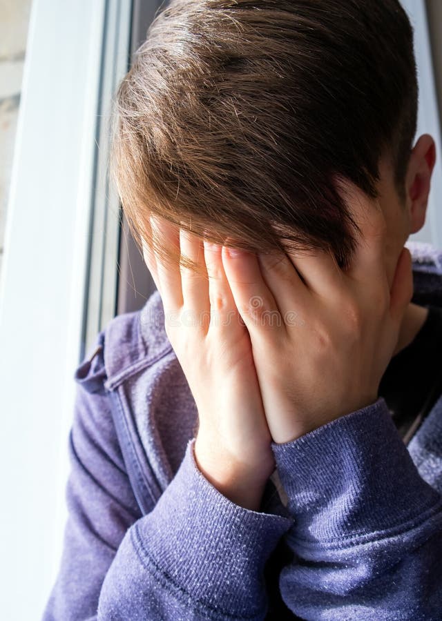 Sad Young Man stock photo. Image of anxiety, crying - 215335960