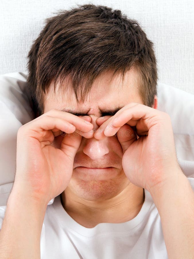 Sad Young Man stock image. Image of male, room, home - 151783517