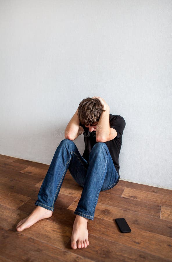 Sad Young Man stock image. Image of domestic, fail, room - 117551679