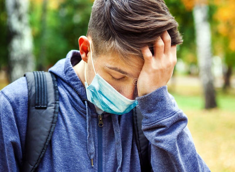 Sad Young Man in Flu Mask stock photo. Image of face - 208637290