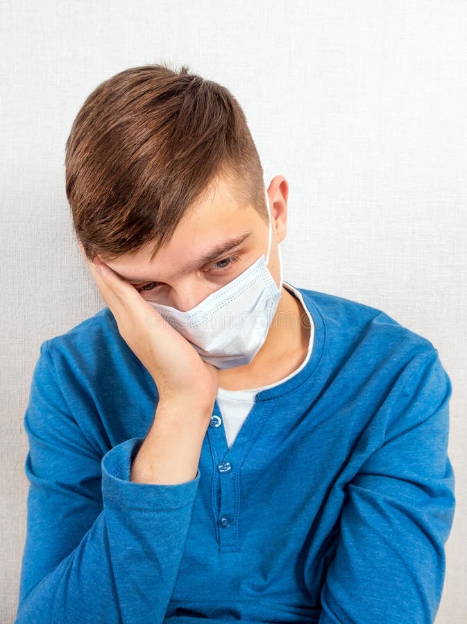 Sad Young Man in Flu Mask stock photo. Image of facial - 204373798