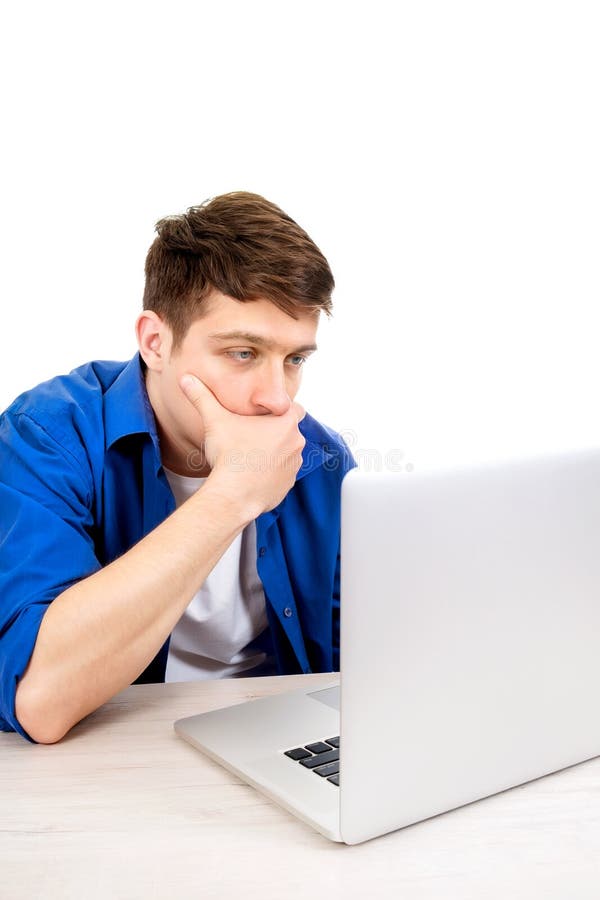 Sad Young Man with Laptop stock image. Image of education - 248333163