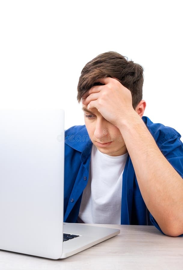 Sad Young Man with Laptop stock image. Image of internet - 320186355