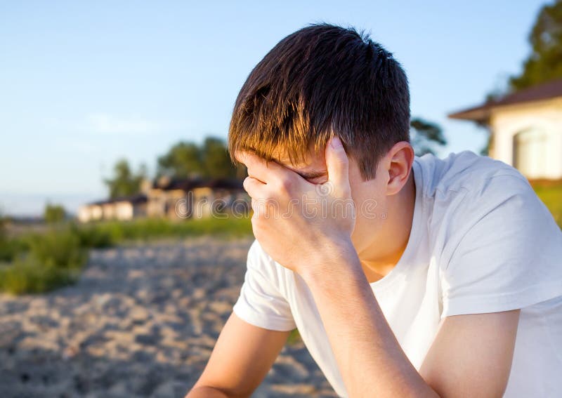 Sad Young Man stock image. Image of summer, grief, downcast - 273532077