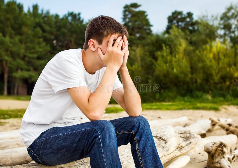 Sad Young Man outdoor stock image. Image of rural, grief - 132561495