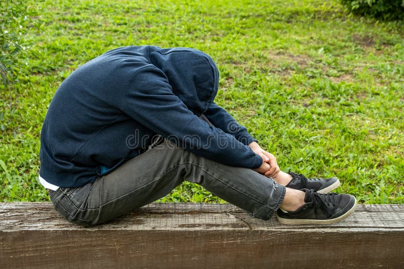 Sad Young Man outdoor stock image. Image of grief, loneliness - 254496267