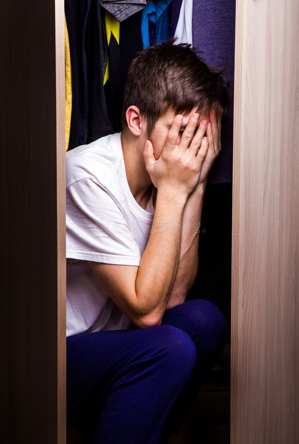 Sad Young Man stock image. Image of male, room, person - 162314287