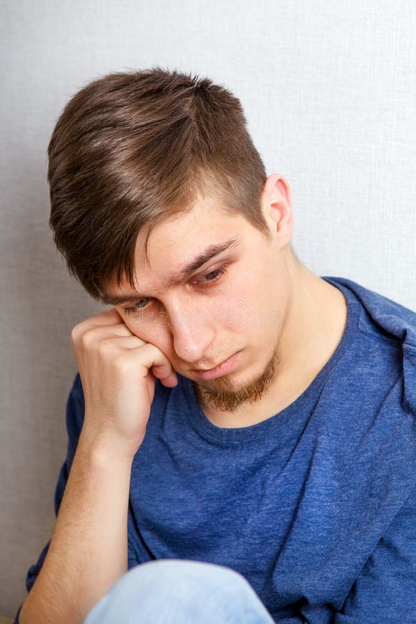 Sad Young Man stock image. Image of confused, think - 166766897