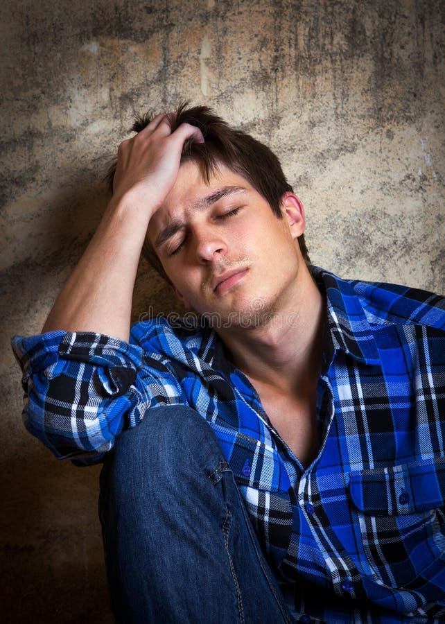 Sad Young Man stock photo. Image of room, cheerless - 106134820