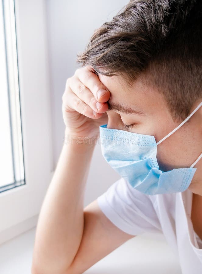 Sad Young Man in Surgical Mask Stock Photo - Image of problem, virus ...