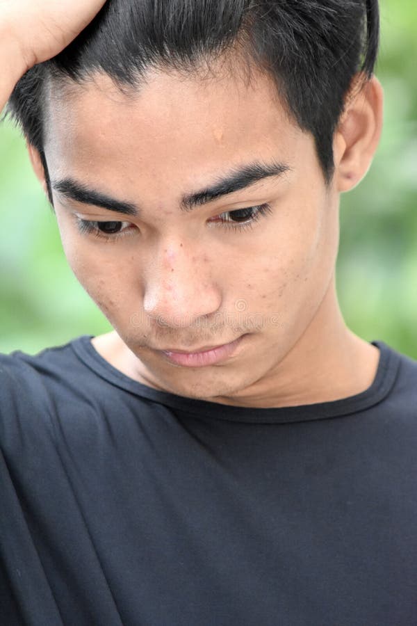 Sad Young Minority Man stock photo. Image of young, youth - 146639740