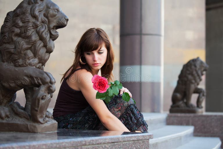 Sad Young Woman with a Rose Stock Image - Image of despair, adult: 15866043