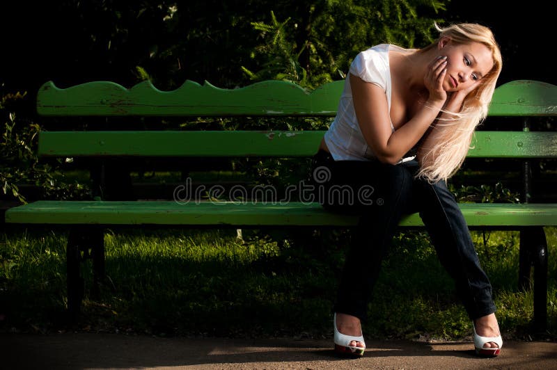 Sad Young Woman Sitting on Bench in Park Stock Photo - Image of nature ...