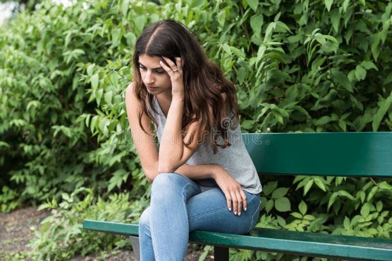 Sad Young Woman Sitting on Bench Stock Photo - Image of growth, people ...