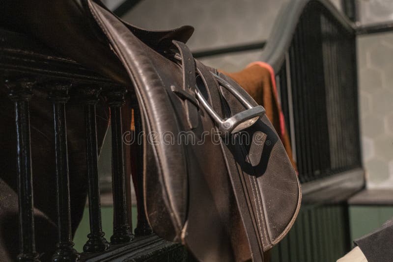 Saddle and Stirrup in Stable Stock Image - Image of equine, horse ...