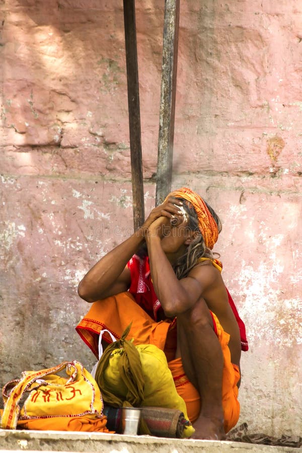 Sadhu (holy Man) Smokes a Pipe Editorial Stock Photo - Image of ...