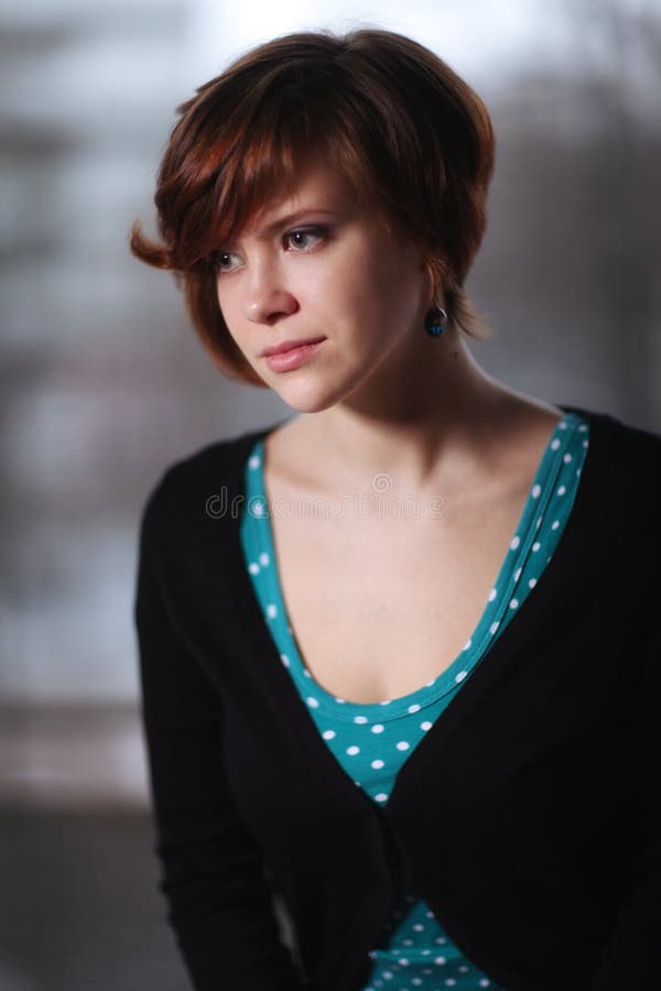 Sadl red-haired girl stock photo. Image of people, isolated - 63291074