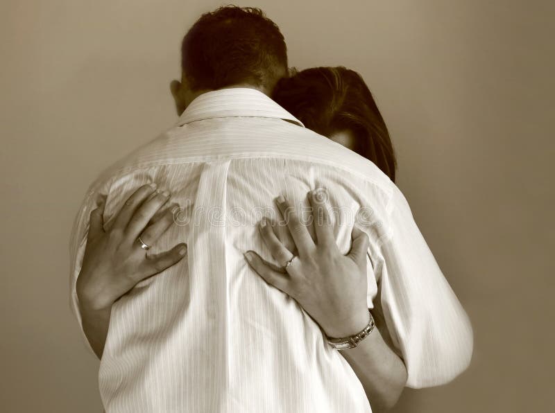 A Girl Crying In A Boys Arms