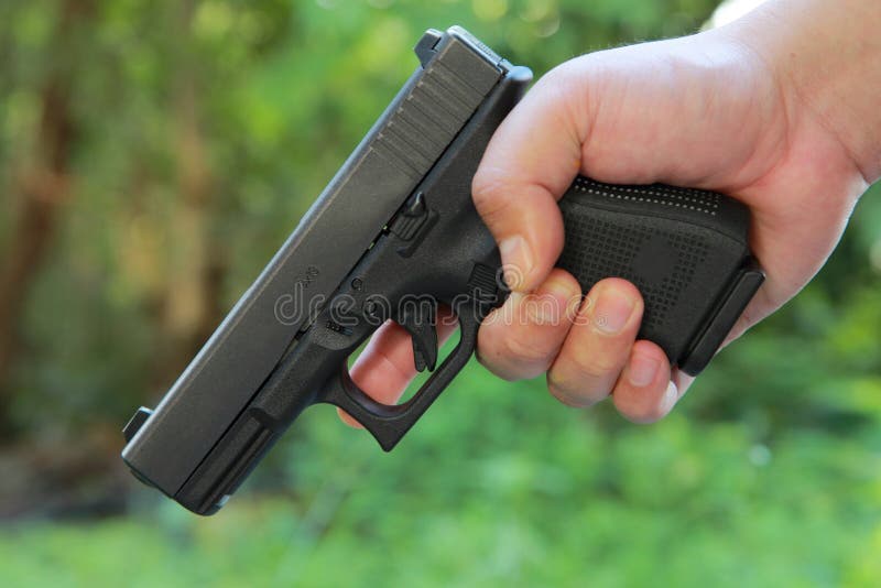 Safe Action with a gun stock photo. Image of projectile - 80692386