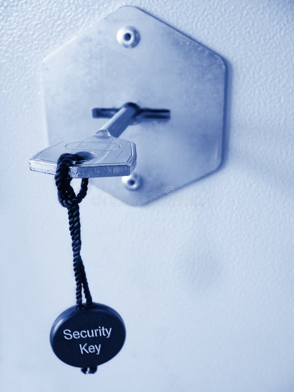 Safe key in a lock stock photo. Image of silver, safe - 6638134
