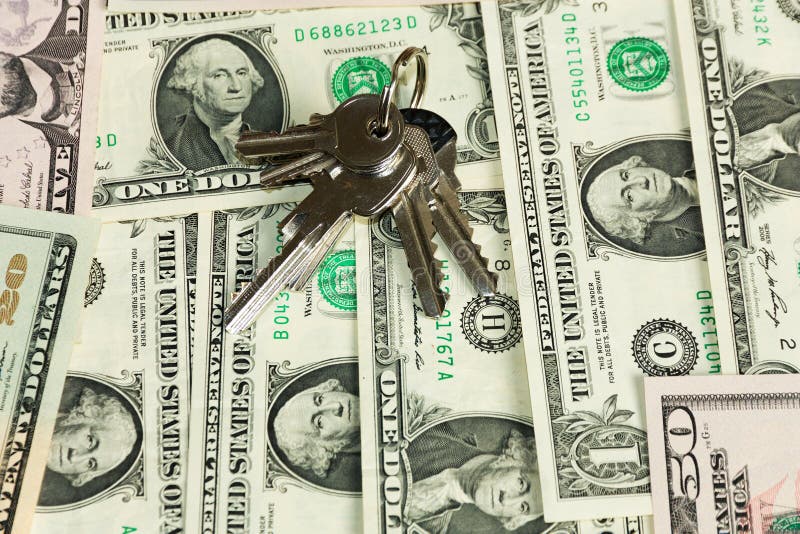 Safe key with money stock image. Image of investment - 40008647