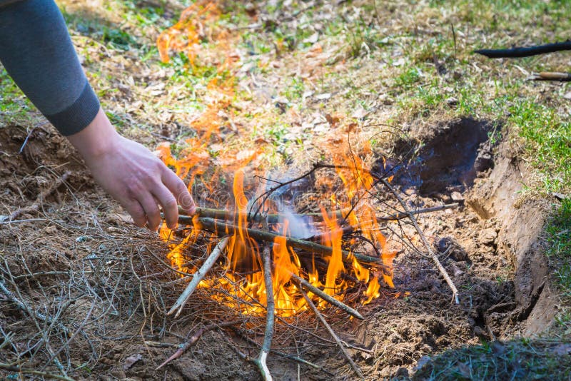 Safely Lighting a Fire in the Forest Countryside Stock Photo - Image of ...
