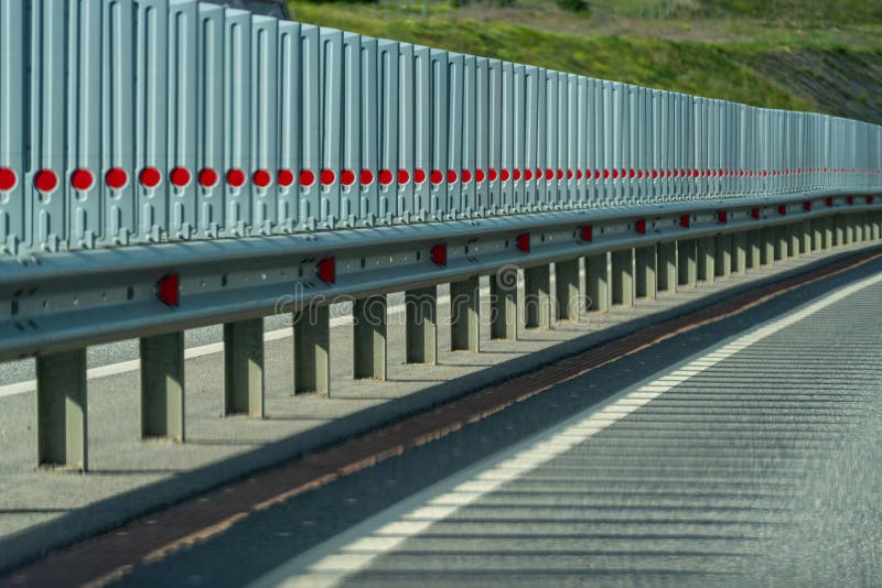 Safety Barriers on Highway. Anodized Safety Steel Barrier. Enhancing ...