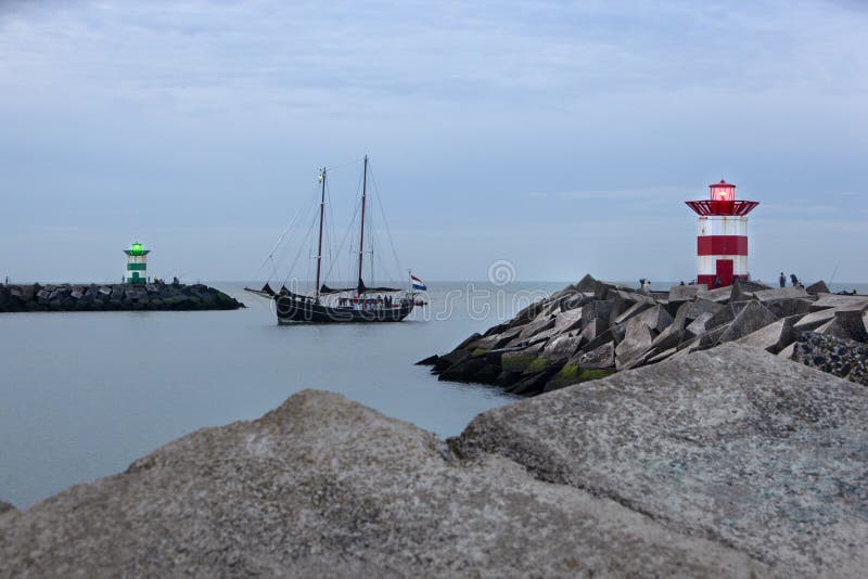 Safety Beacons and a Ship in Scheveningen Stock Photo - Image of town ...