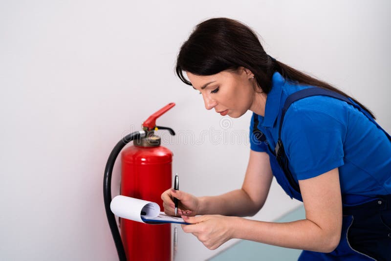 Safety Checking Fire Extinguisher Stock Photo - Image of fire ...