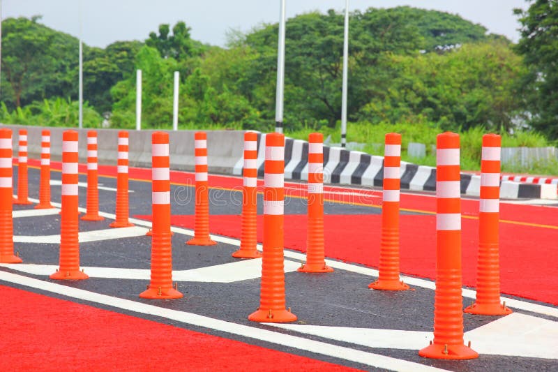 Safety Delineator with White Stripe on Plastic Pole. Traffic Safety ...