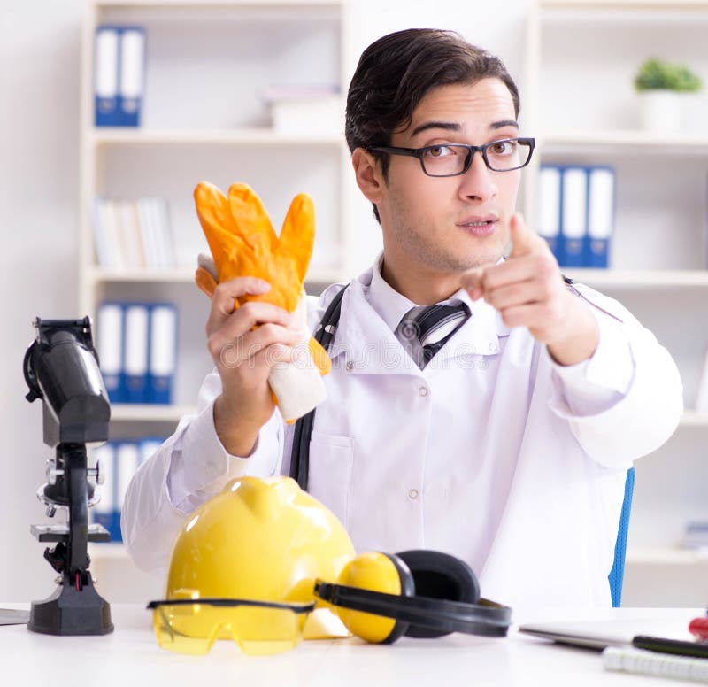 Safety Doctor Advising about Wearing Protective Gloves Stock Photo ...