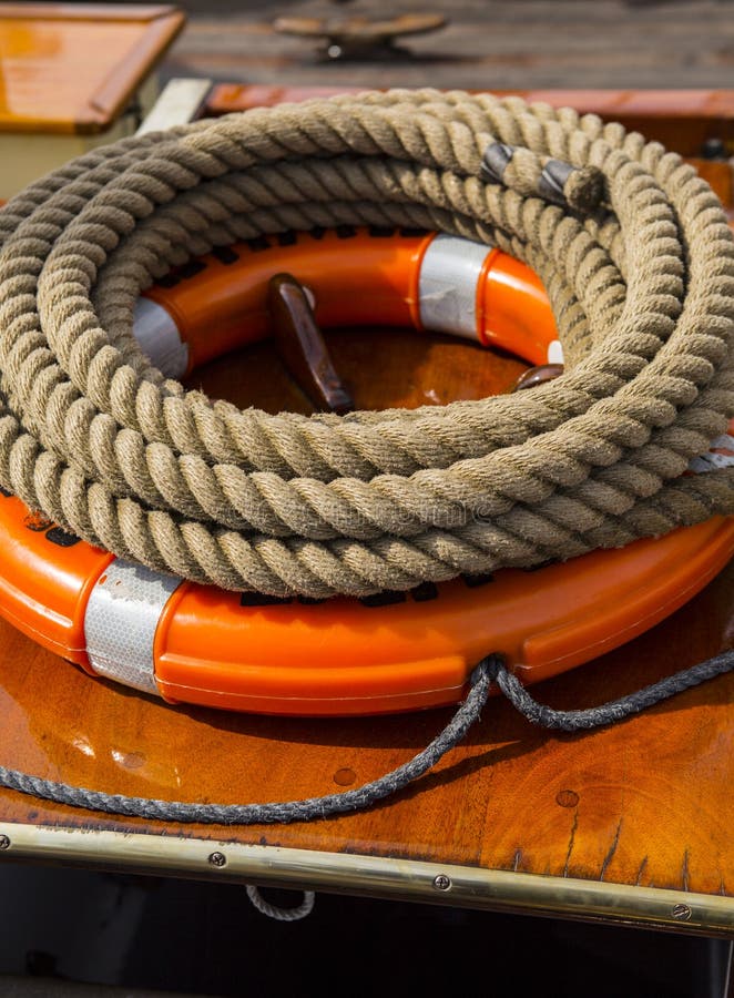 Coiled Ropes and Life Preserver on a Rigged Ship Stock Photo - Image of ...