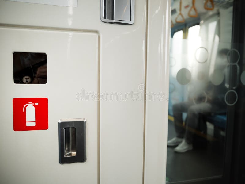 Safety Fire Extinguisher Panel Box with Red Symbol in Commuter Subway ...