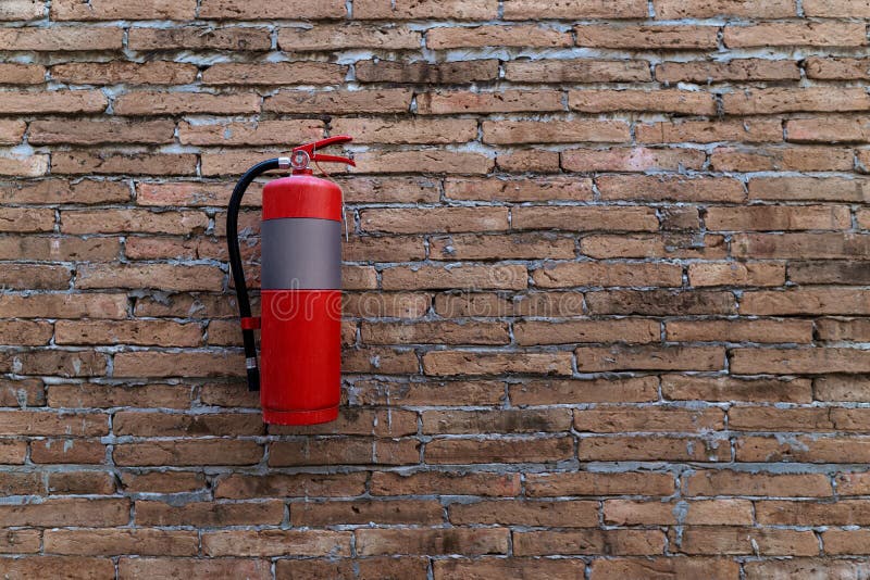 Safety Fire Extinguisher on the Wall Stock Image - Image of concrete ...