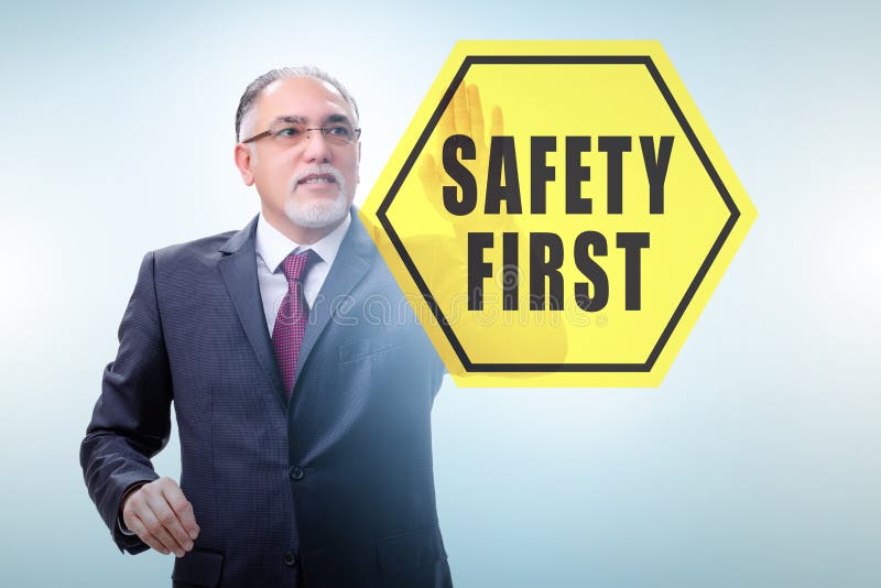 Safety First Concept with Businessman Stock Image - Image of careful ...