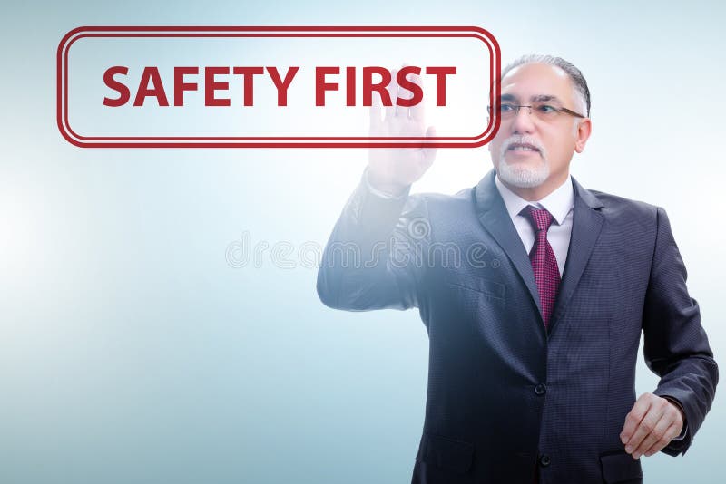 Safety First Concept with Businessman Stock Image - Image of workplace ...