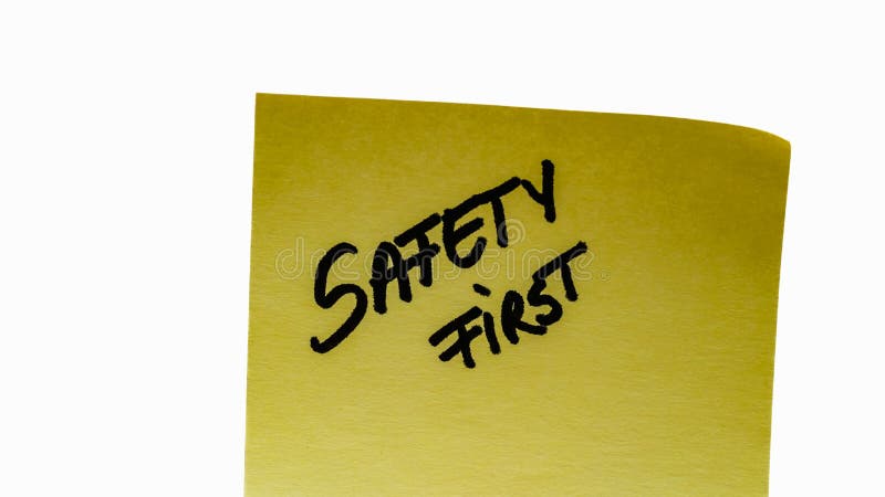 Safety First Handwriting Text Close Up Isolated on Yellow Paper with ...